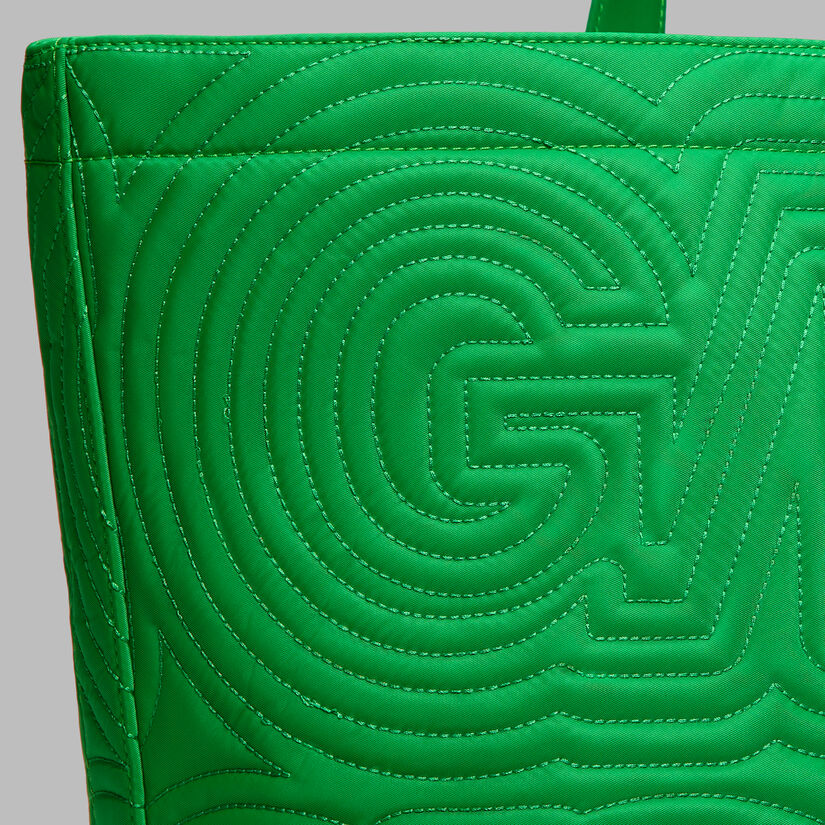 green geometric pattern bag